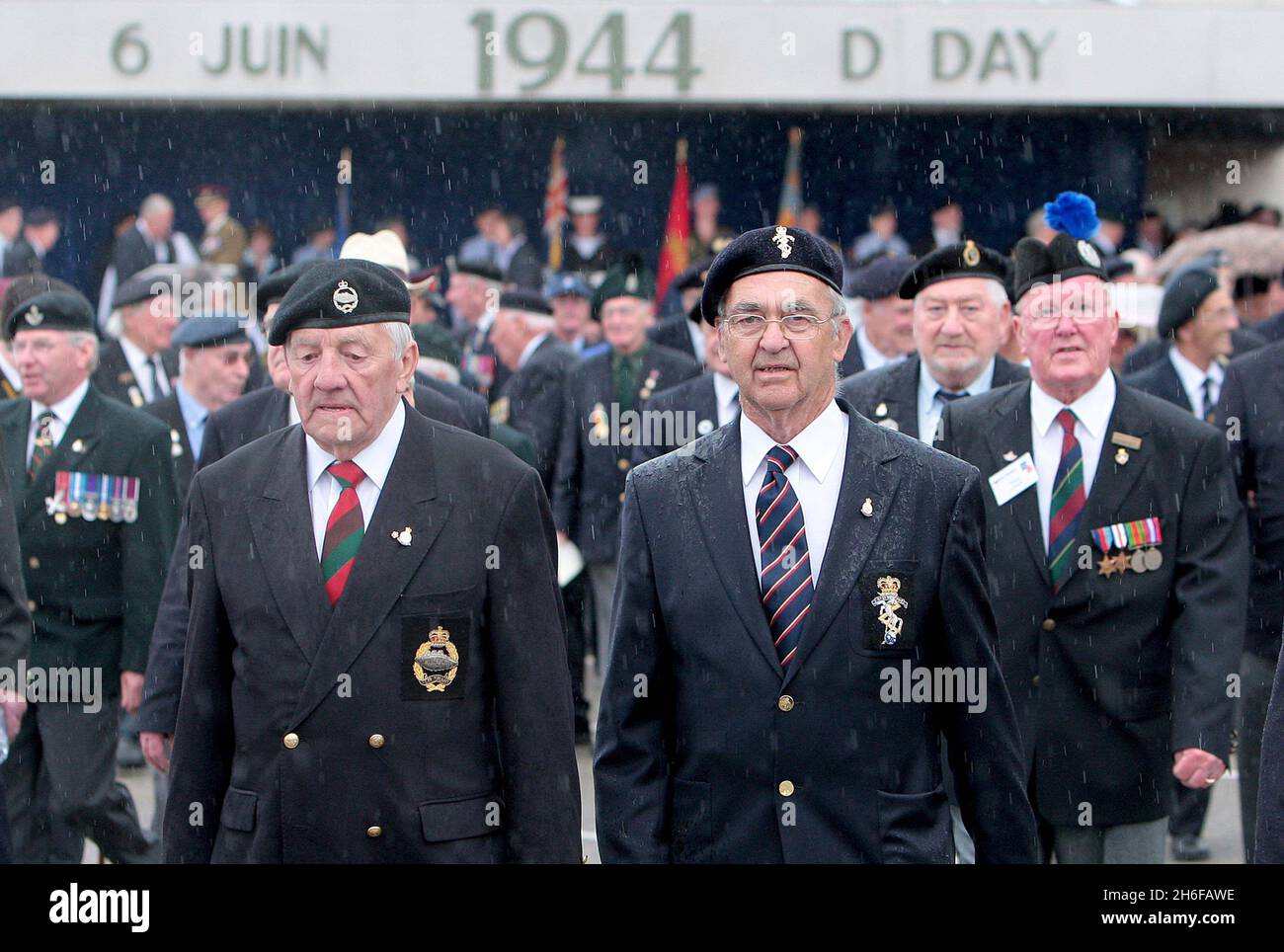Normandy war veterans finished their march past Arromanche in France ...