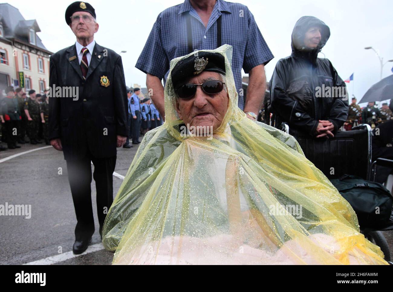 Normandy war veterans finished their march past Arromanche in France ...