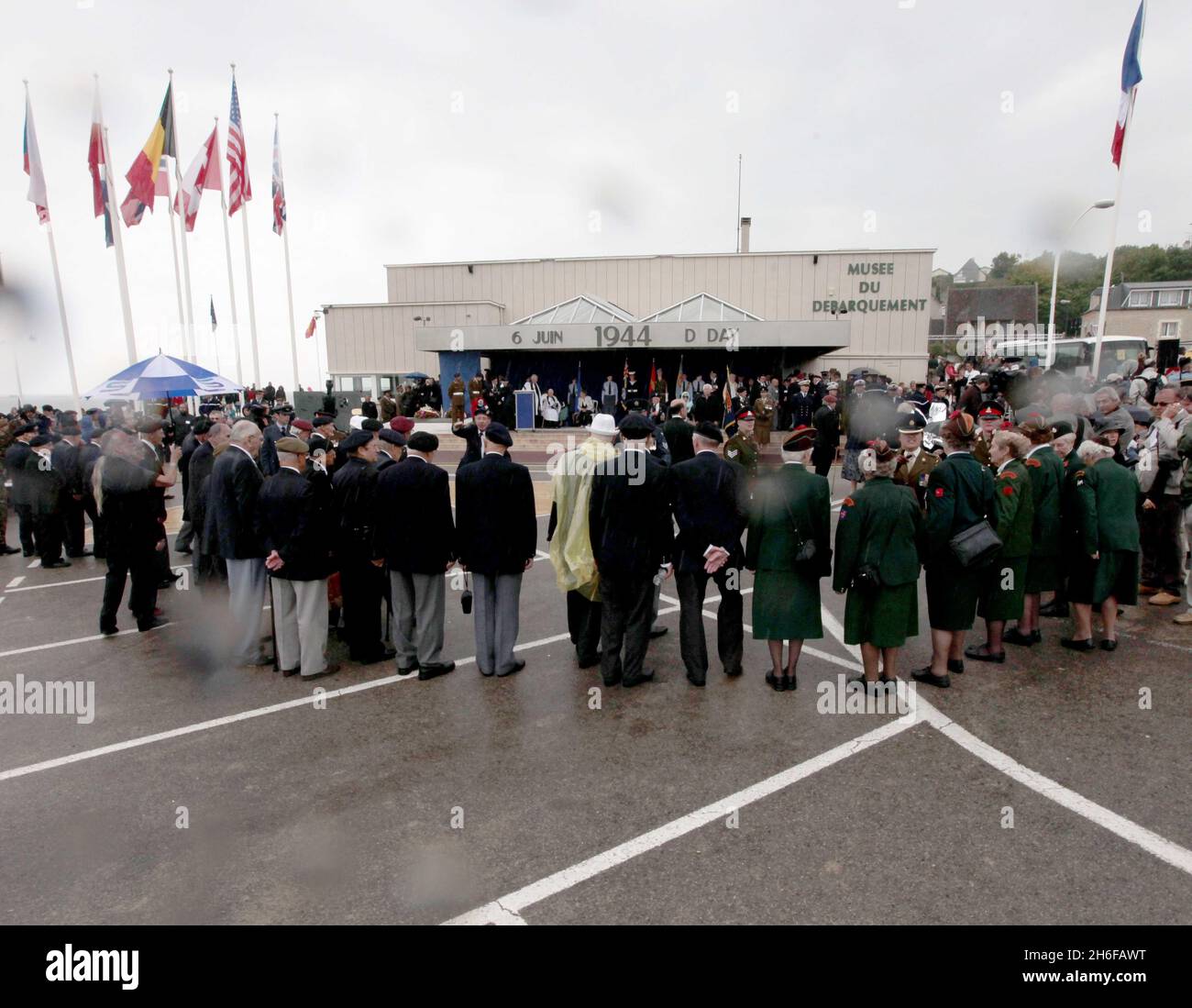 Normandy war veterans finished their march past Arromanche in France ...