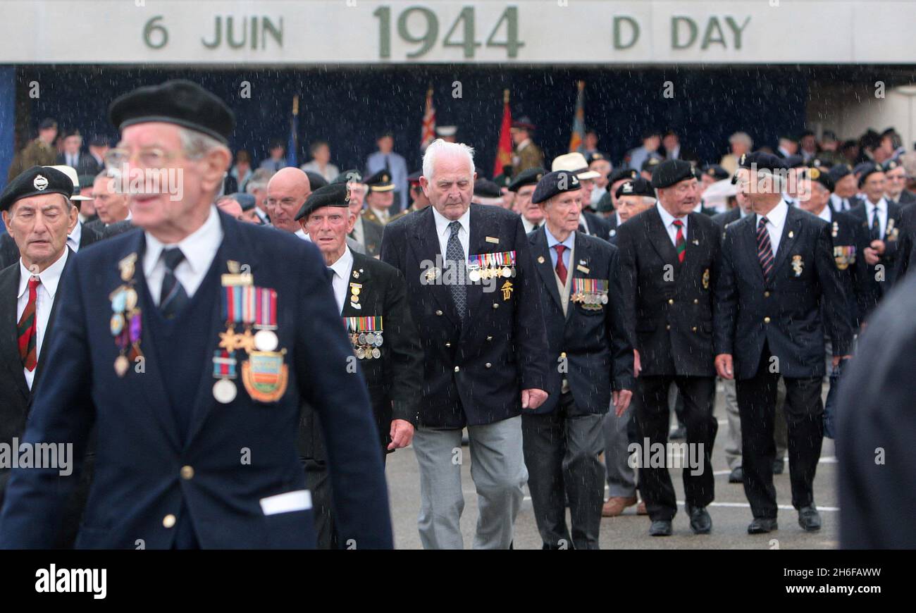Normandy war veterans finished their march past Arromanche in France ...