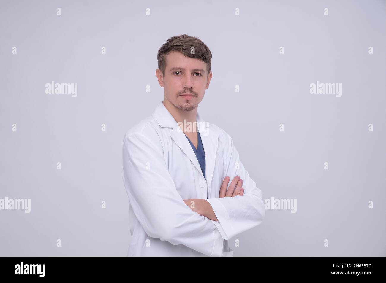 Doctor in medical uniform standing hi-res stock photography and images ...
