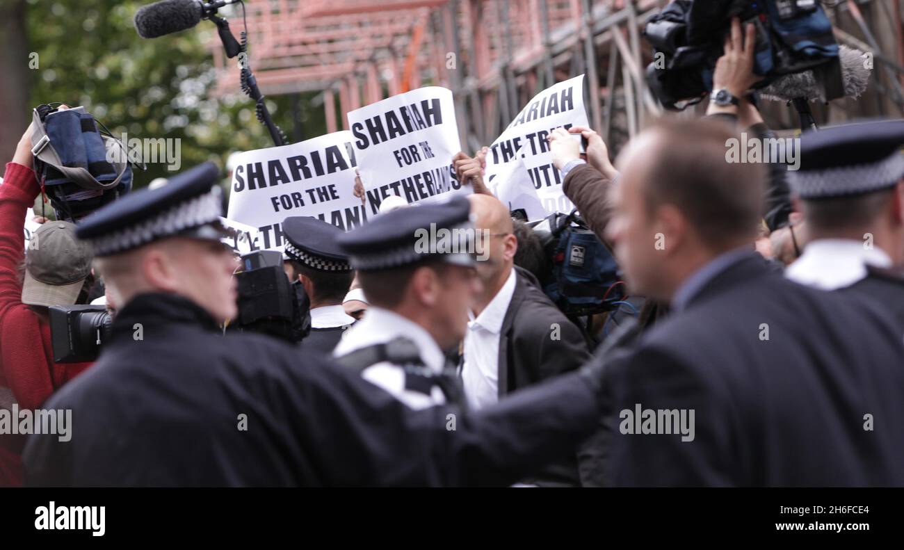 Protestors pictured in Westminster this afternoon as the controversial ...
