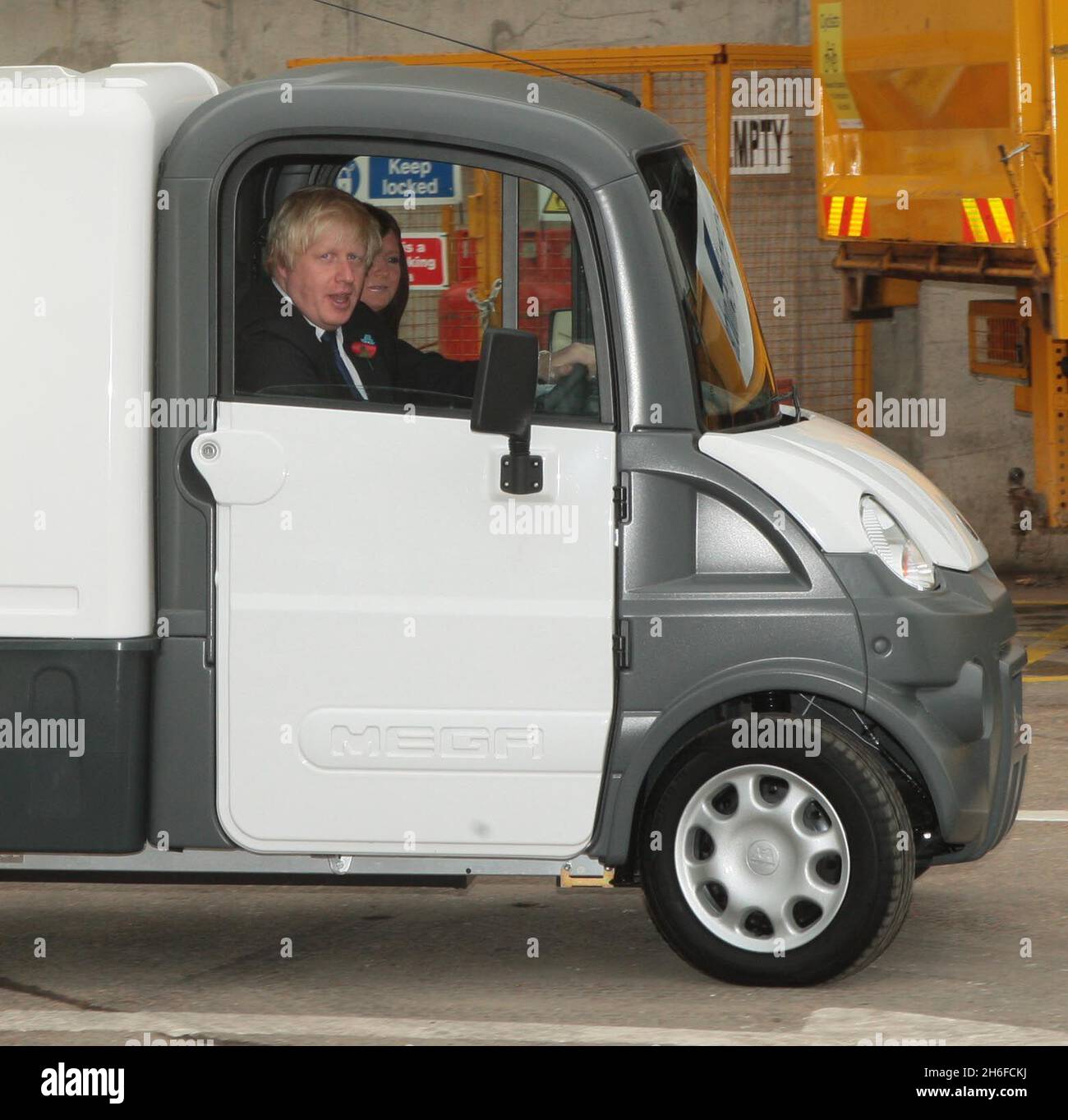 London Mayor Boris Johnson gets behind the wheels of an electric van in ...