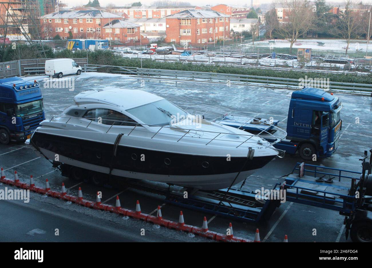 Boat arrive at an icy Excel in London this morning in preparation for ...
