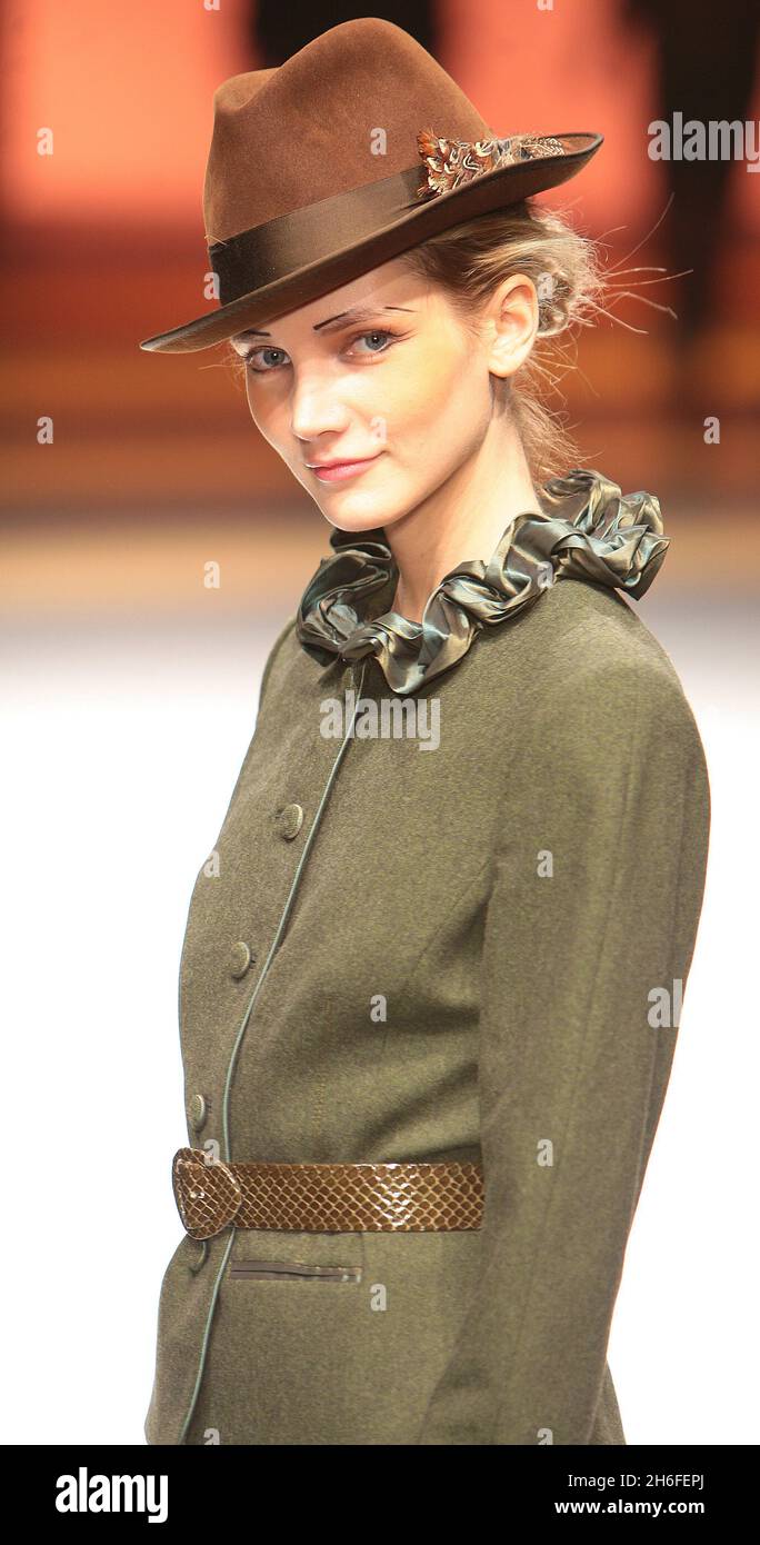 A model on the catwalk during the show by Caroline Charles as part of ...