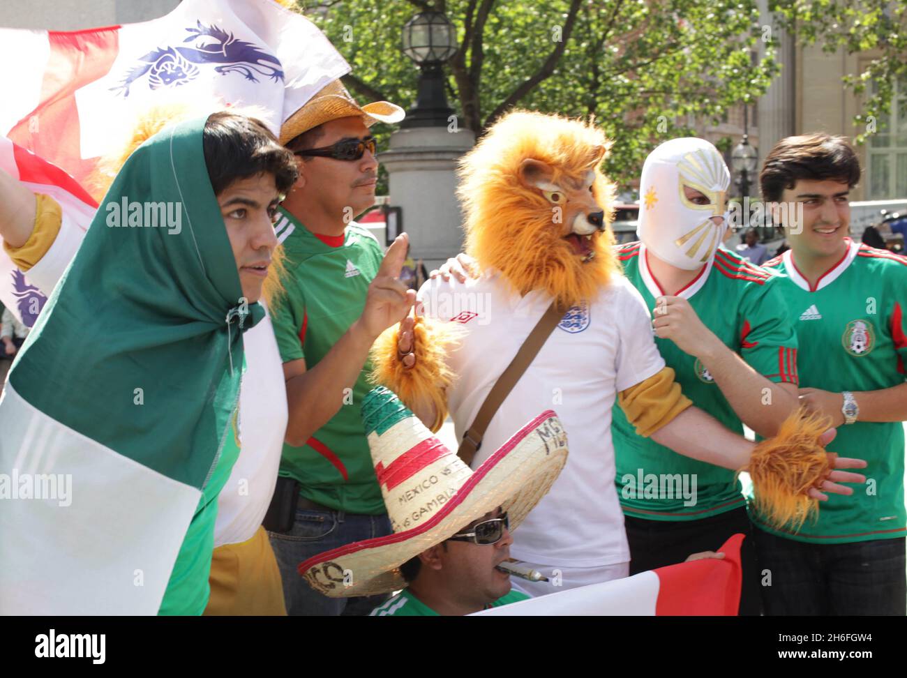 England and Mexican football fans enjoyed the hot sun in Trafalgar ...