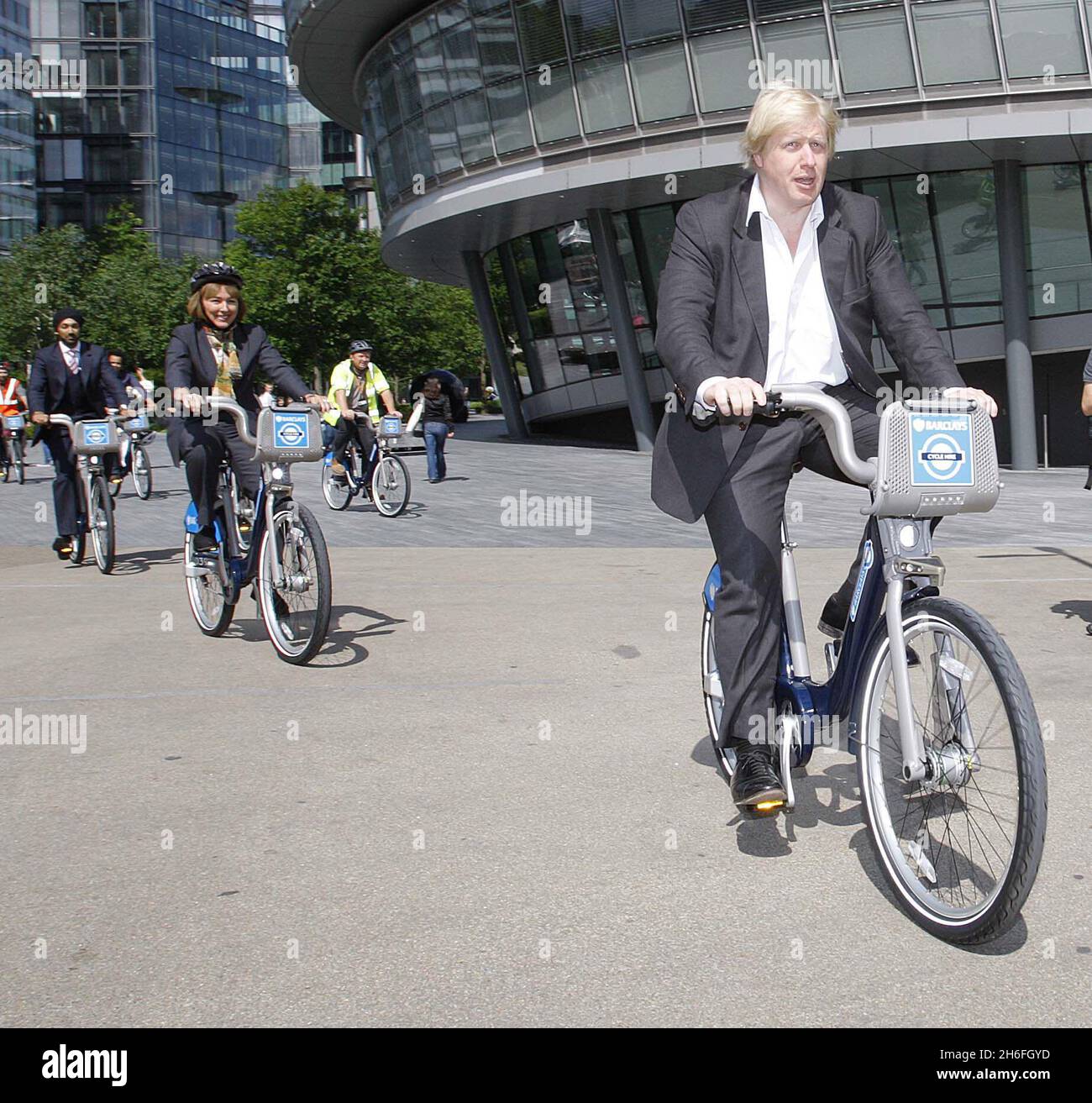 Mayor of London Boris Johnson rides a Barclays Cycle Hire bike with ...