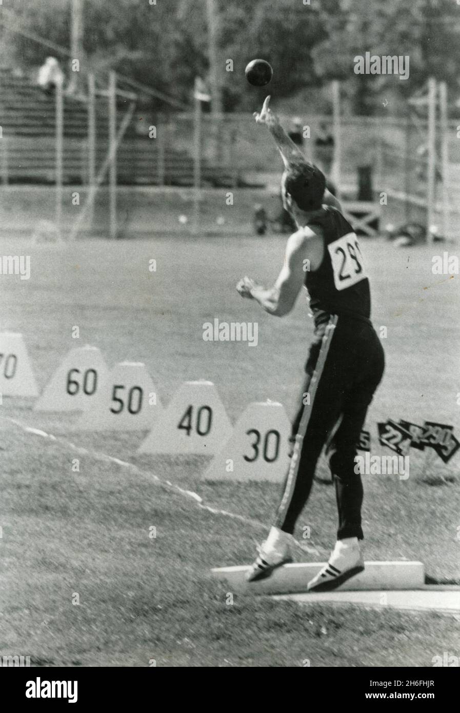 Athlete competing to the shot put speciality, USA 1967 Stock Photo - Alamy