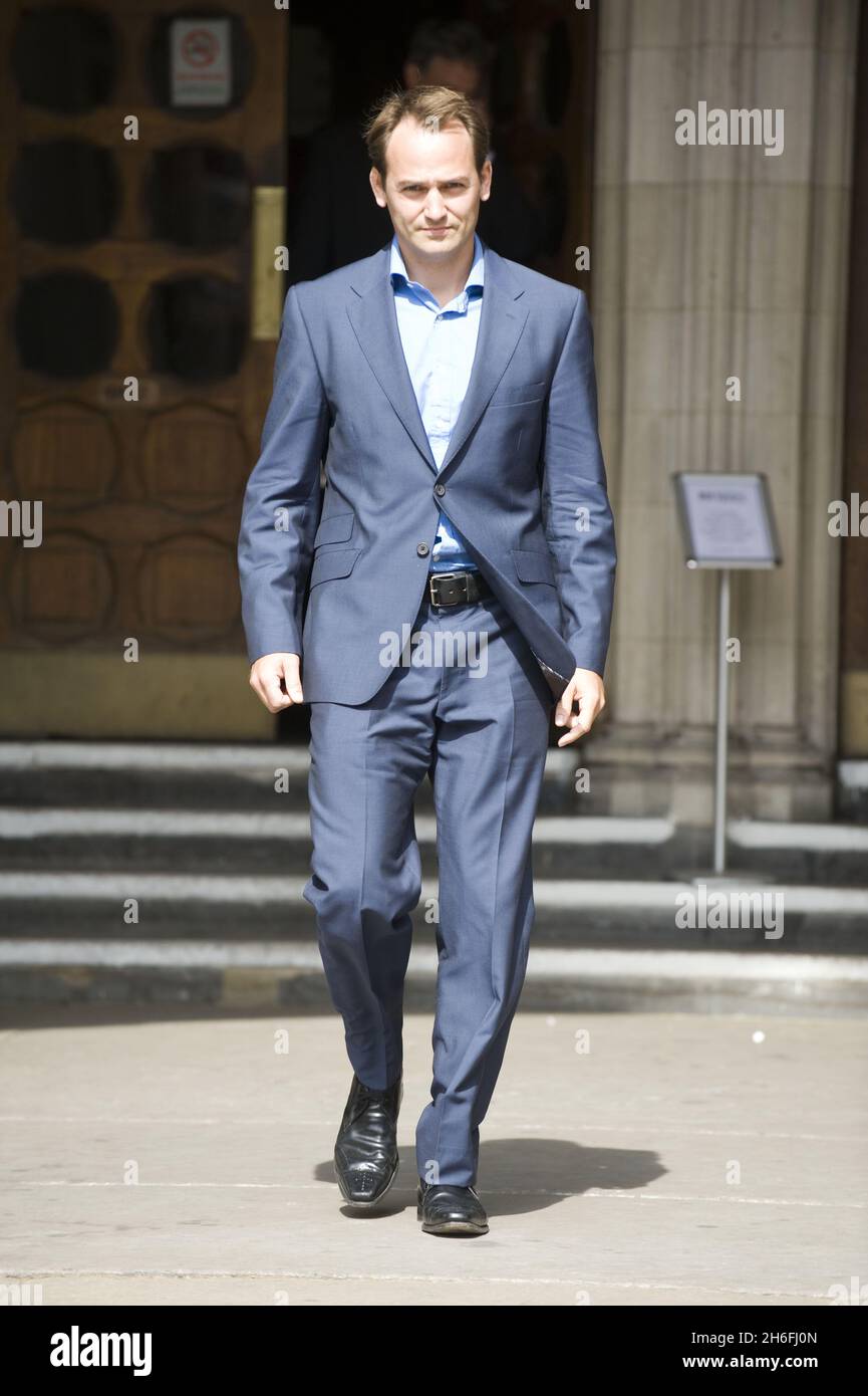 Ben Collins, known as The Stig, is pictured at the High Court in London ...