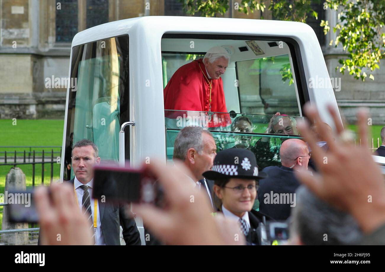 Pope Benedict XVI pictured blessing a young boy in Westminster this ...