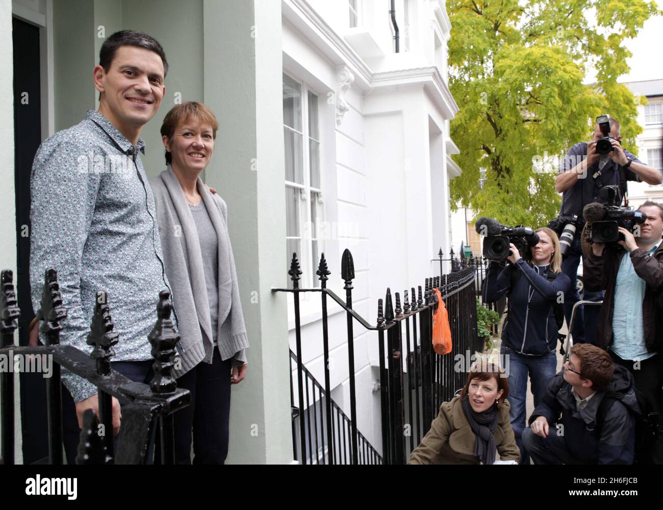 David Miliband poses with his wife Louise Shackleton outside their ...