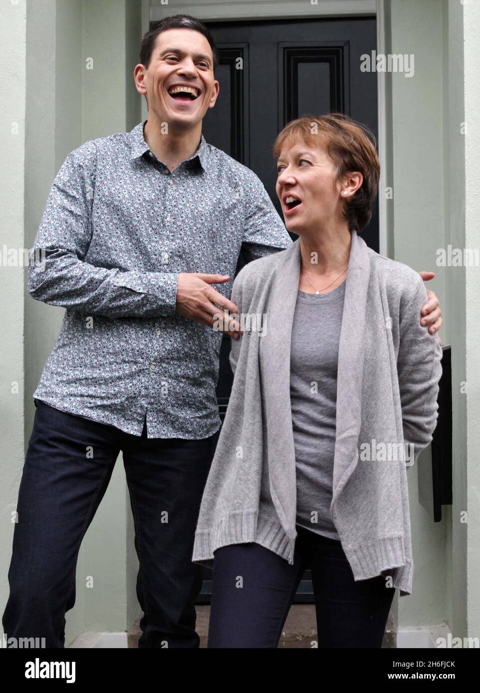 David Miliband poses with his wife Louise Shackleton outside their ...