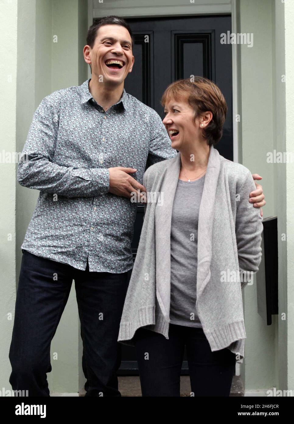 David Miliband poses with his wife Louise Shackleton outside their ...