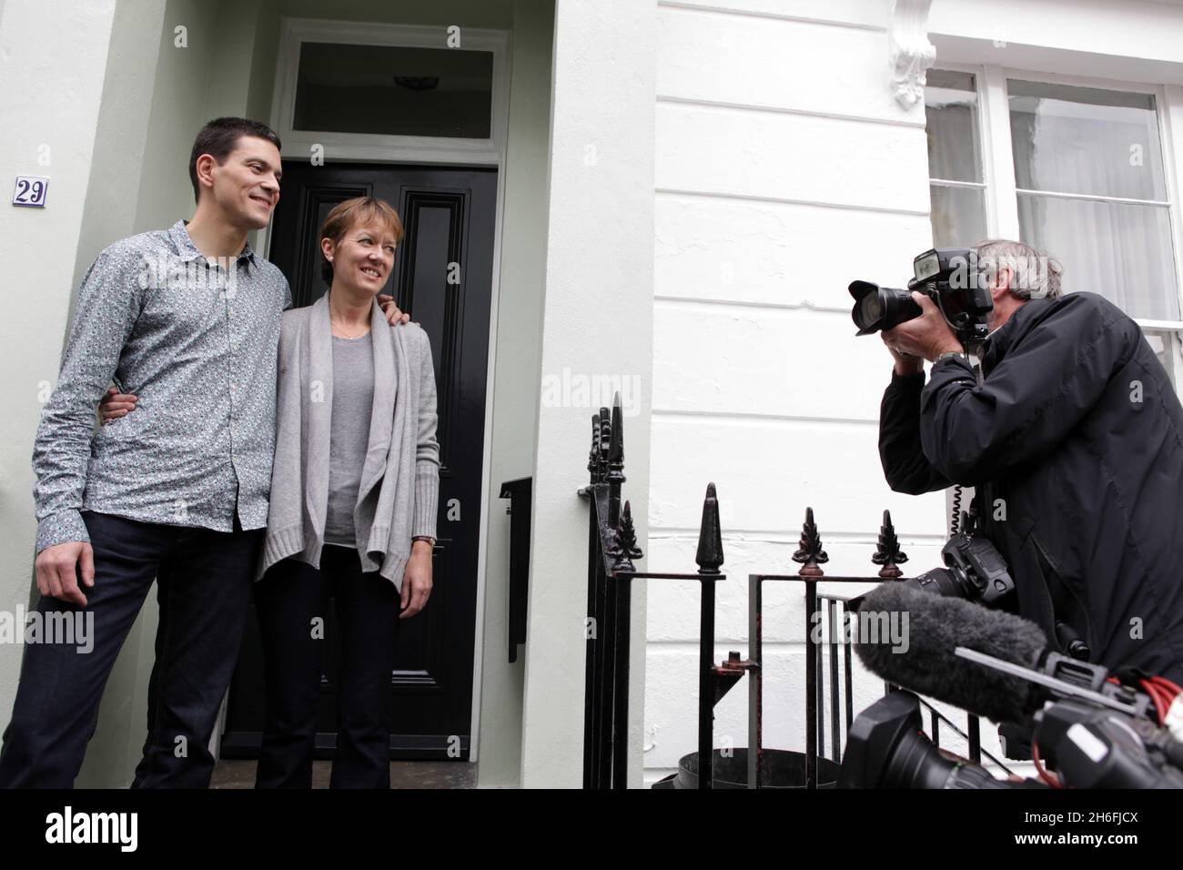 David Miliband poses with his wife Louise Shackleton outside their ...