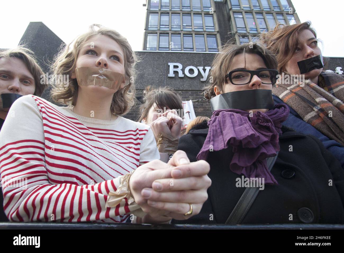 Students tape their hands and mouths in London today ahead of tomorrow ...