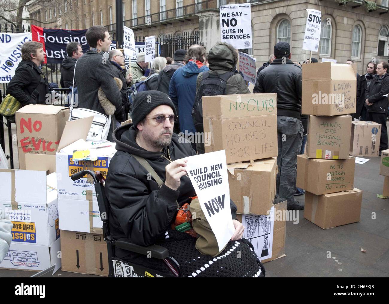 Demonstrators built a cardboard city on Whitehall to protest over cuts ...