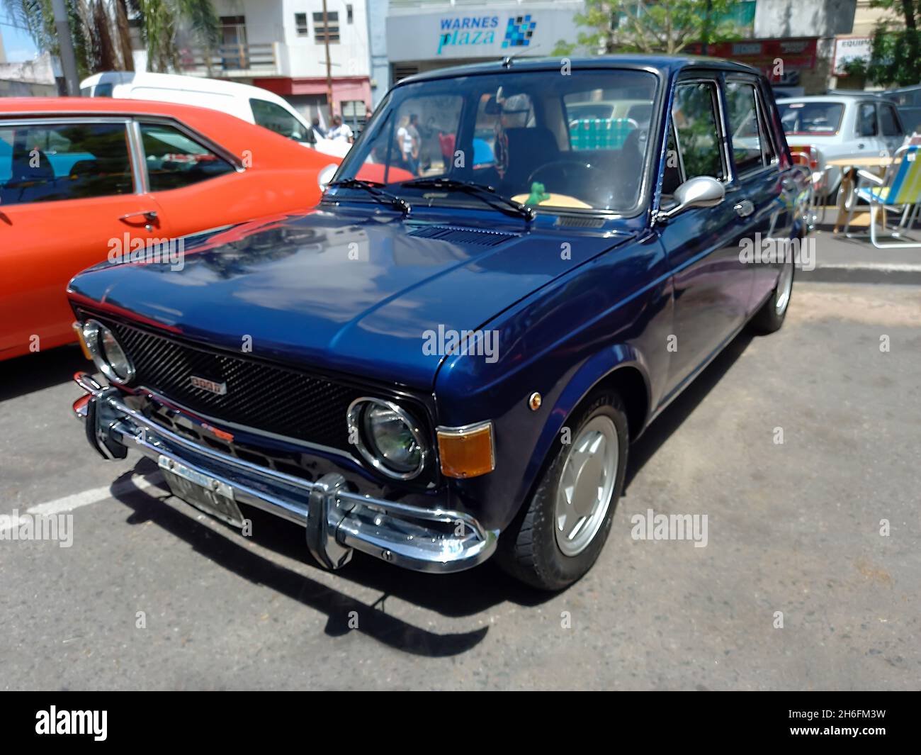 blue Fiat 128 sedan four door small family car 1970s. Expo Warnes 2021 ...