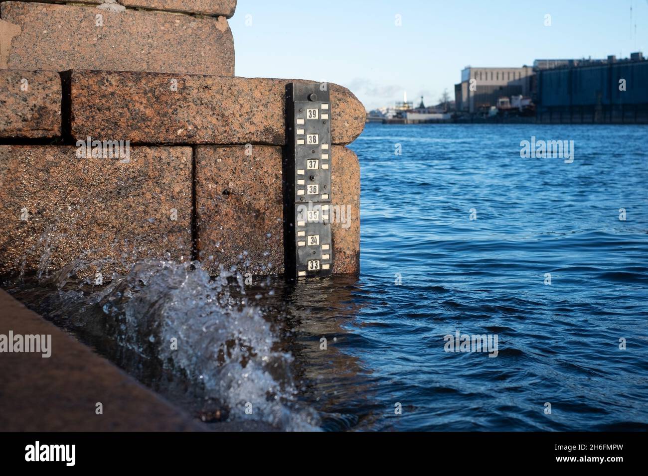 Scale of water level indications in the river Stock Photo - Alamy