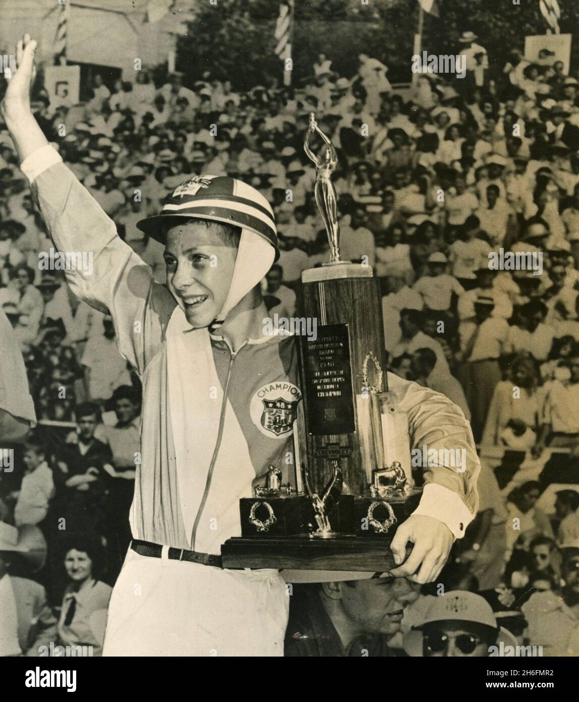 Donald F. Strub, winner of the 1948 Soap Box Derby with the trophy ...