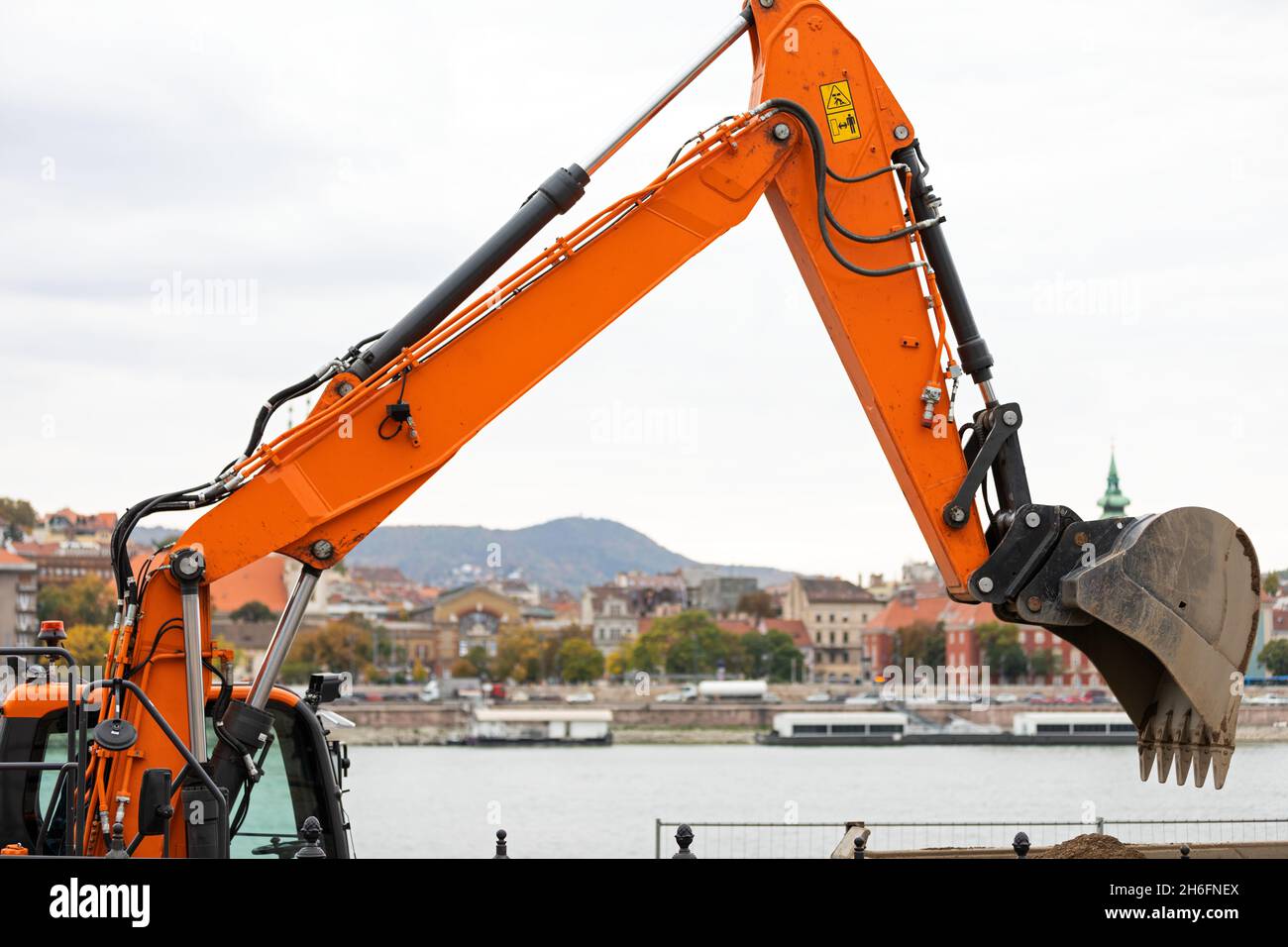 Picture of an excavators machine in construction site Stock Photo - Alamy