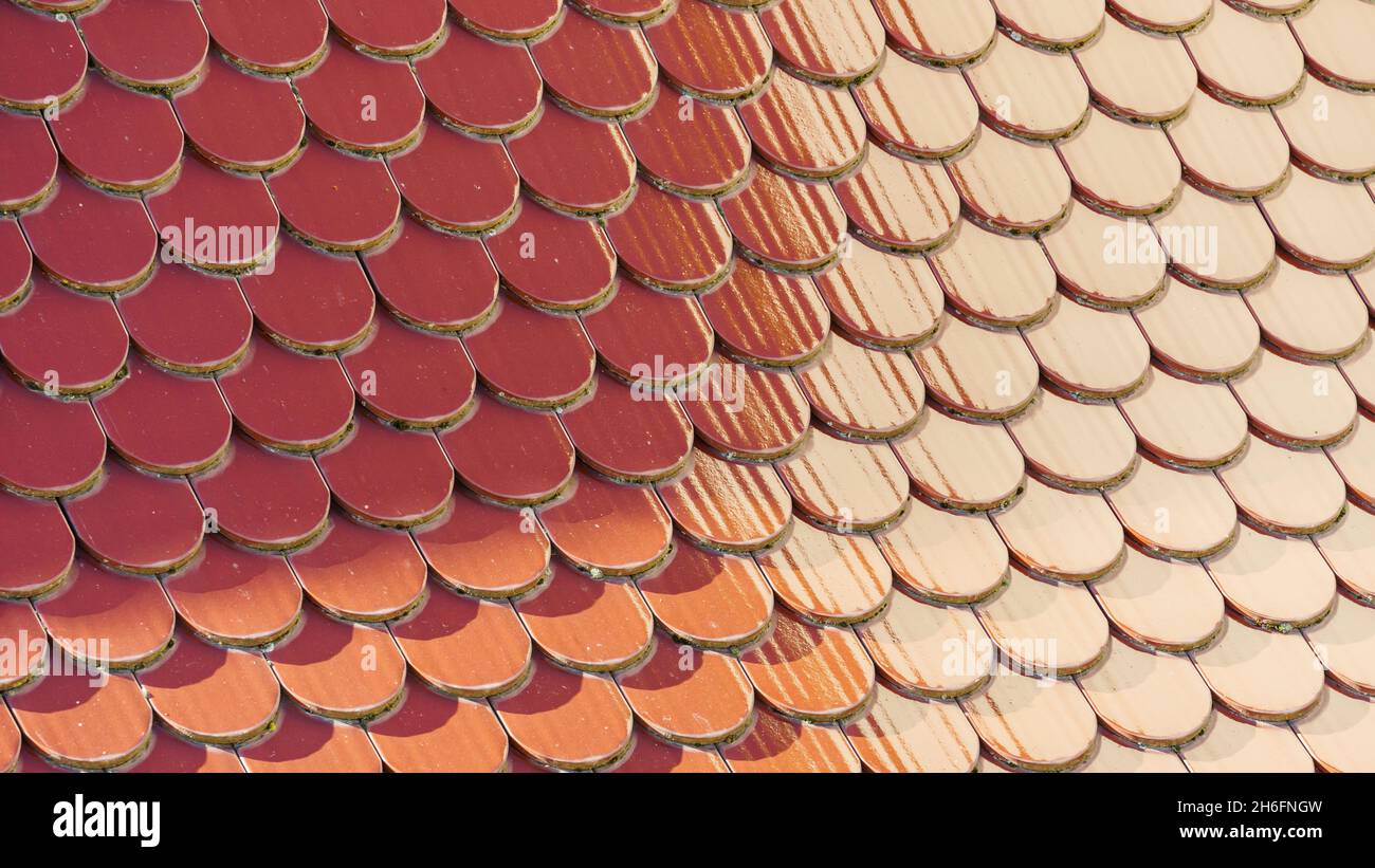 Red roof tiles details background Stock Photo - Alamy