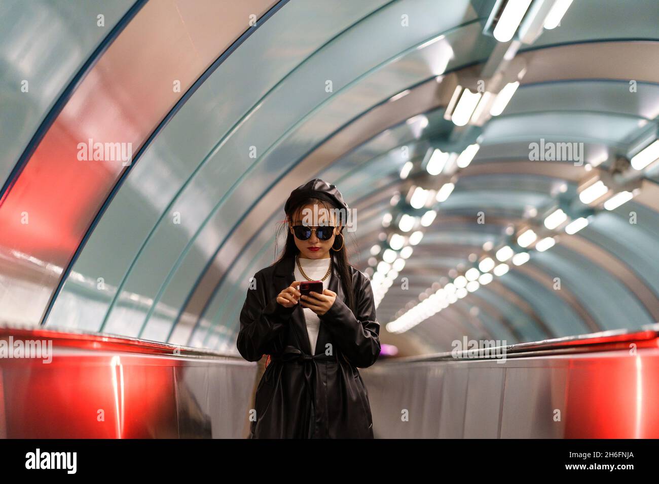 Young lifestyle blogger korean girl posting to social media ride ...