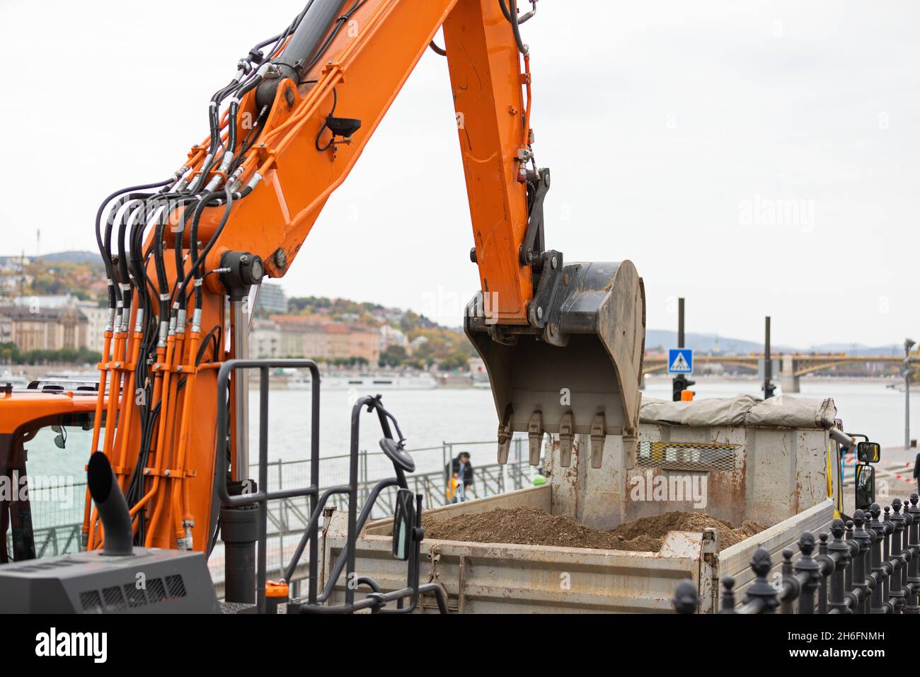 Picture of an excavators machine in construction site Stock Photo - Alamy