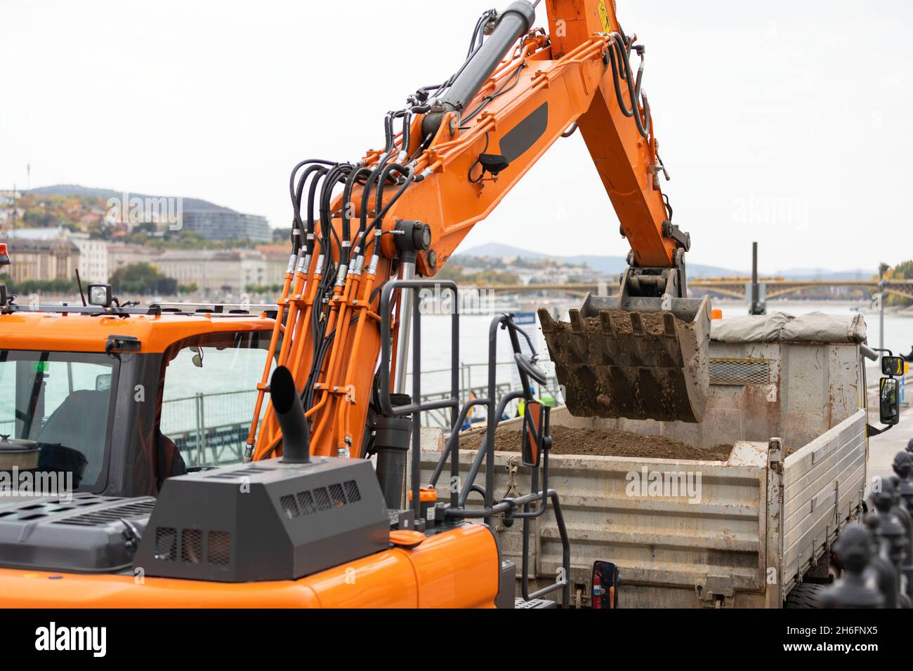 Picture of an excavators machine in construction site Stock Photo - Alamy
