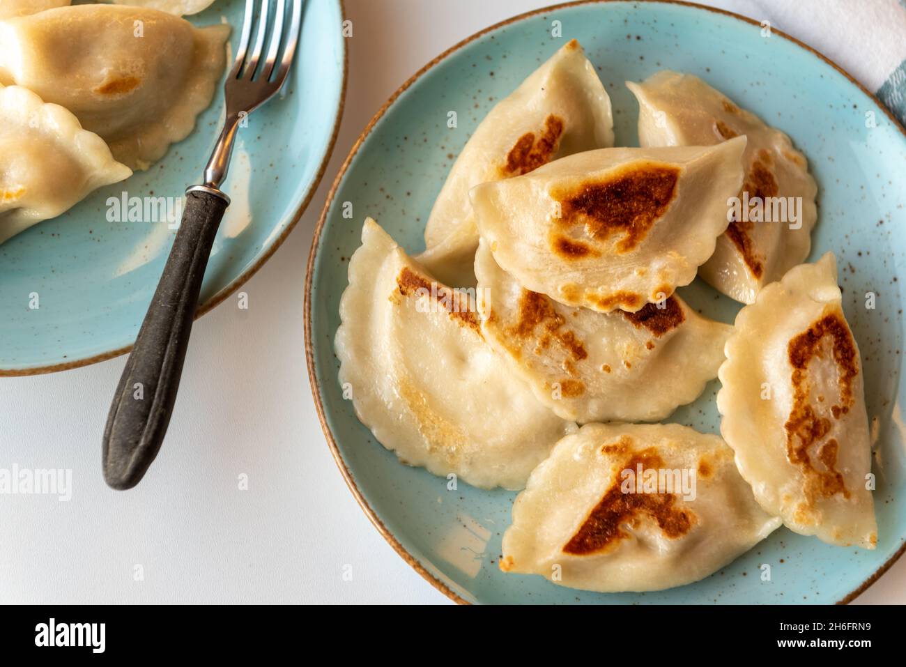 Fried dumplings. Traditional Polish cuisine Stock Photo - Alamy