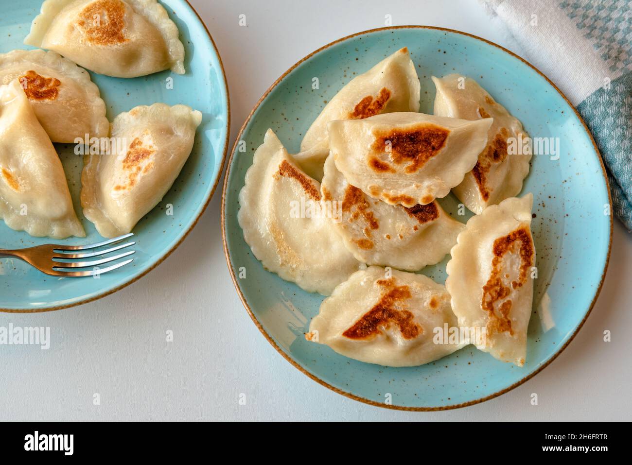 Fried dumplings. Traditional Polish cuisine Stock Photo - Alamy