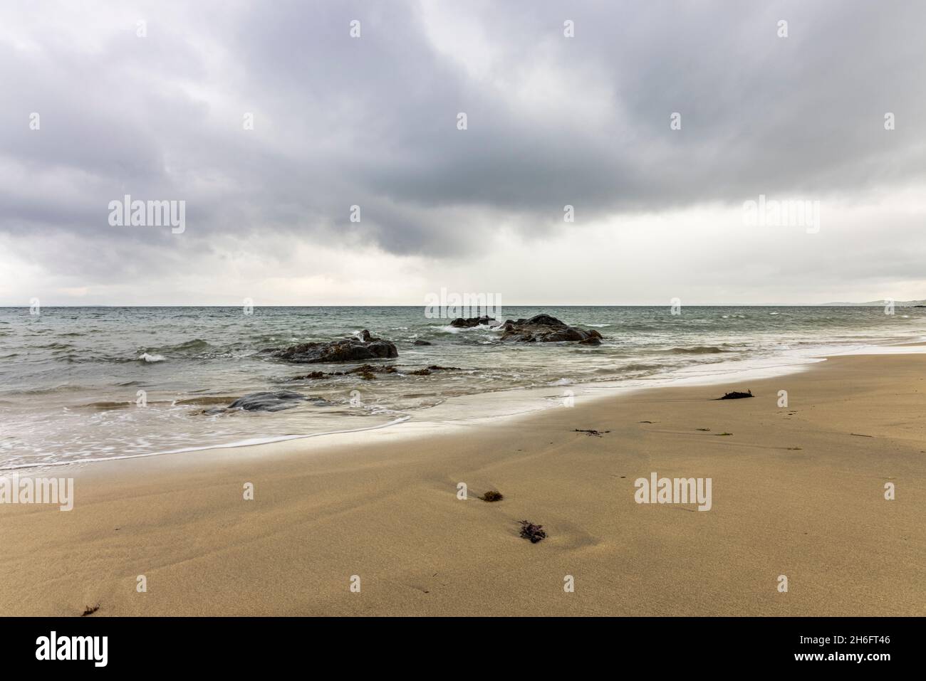 Beach and rocks at the shoreline on Old Head beach, Louisburgh, County ...