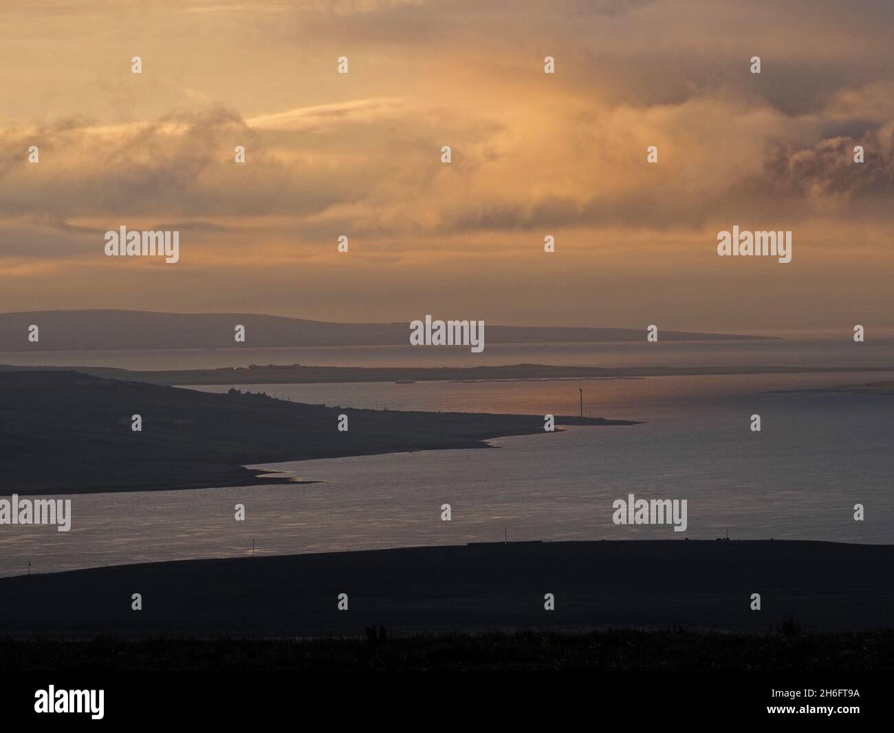 dramatic landscape image of silver sea, headlands and distant islands ...