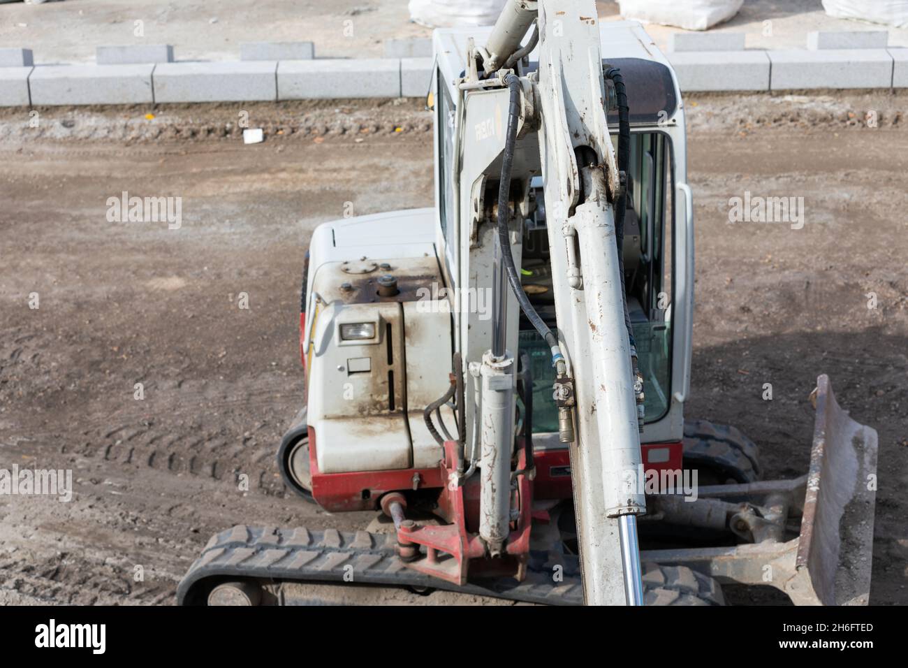 Picture of an excavators machine in construction site Stock Photo - Alamy