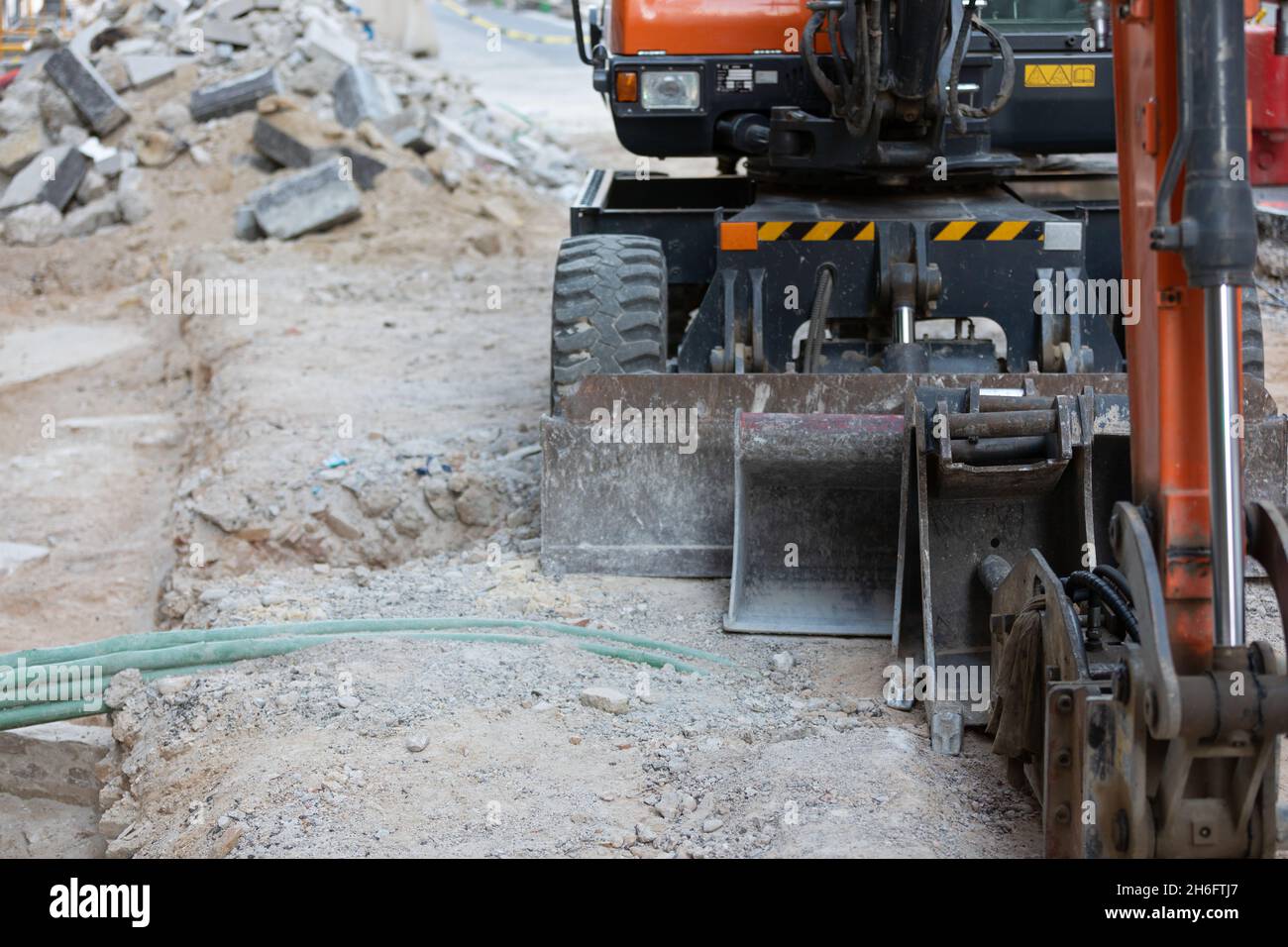 Picture of an excavators machine in construction site Stock Photo - Alamy