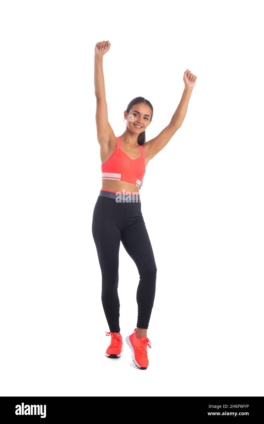 Sport fitness woman excited happy smile hold raised arms hands up ...