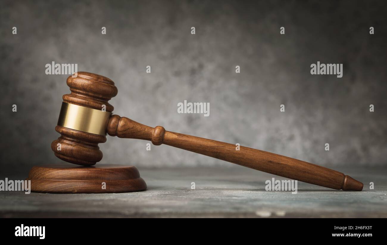 Wooden judge gavel on abstract background, close-up Stock Photo - Alamy