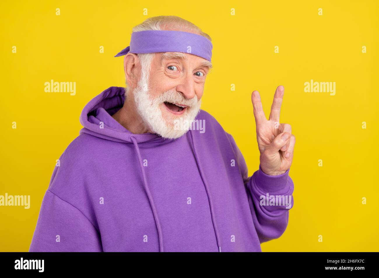 Photo of cheerful retired man show fingers hello peace v-symbol ...