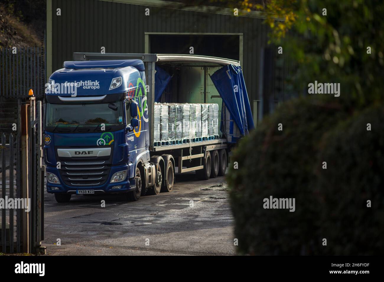 A lorry loading at a factory near Halifax, Calderdale, West Yorkshire ...
