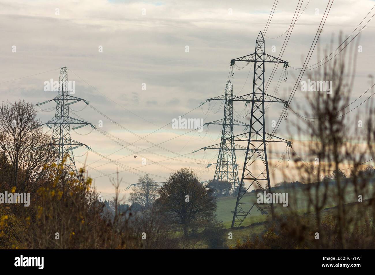 Electricity pylons traverse the Pennine countryside near Halifax ...