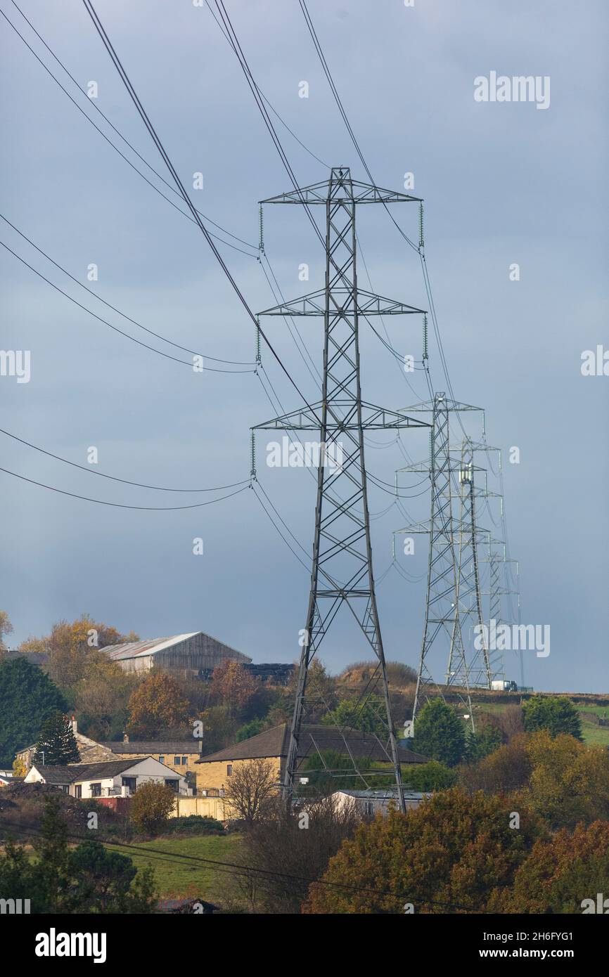 Electricity pylons traverse the Pennine countryside near Halifax ...