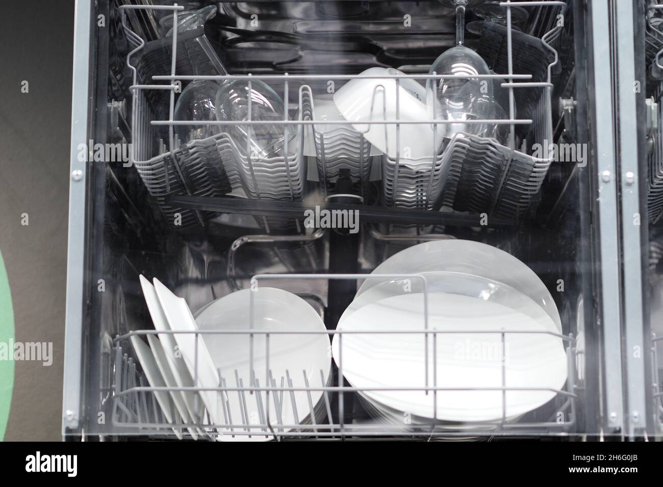 Full washing machine hi-res stock photography and images - Alamy