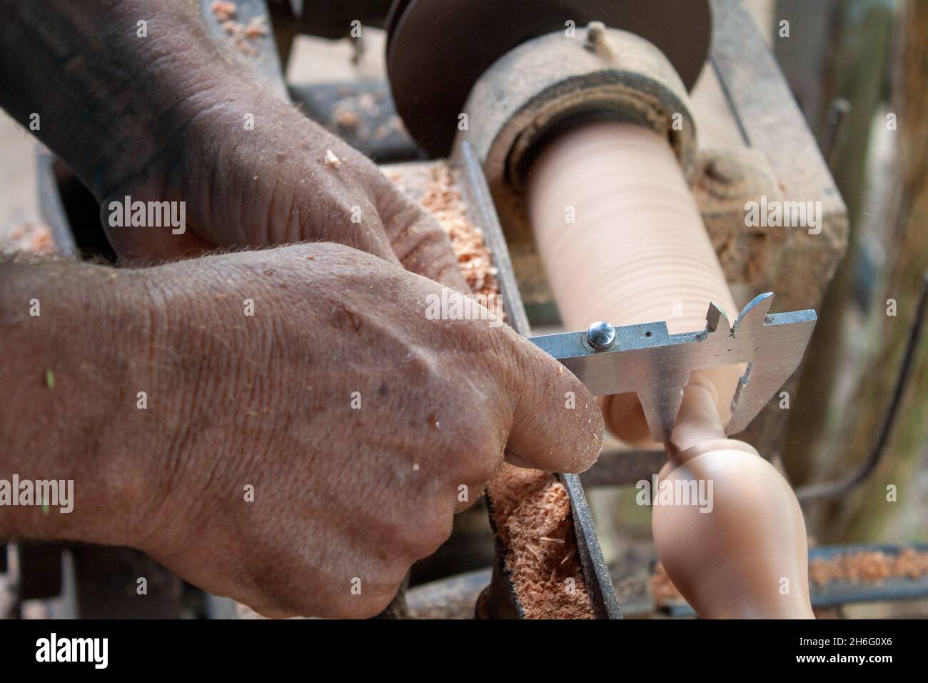 Senior hands turning wood Stock Photo - Alamy