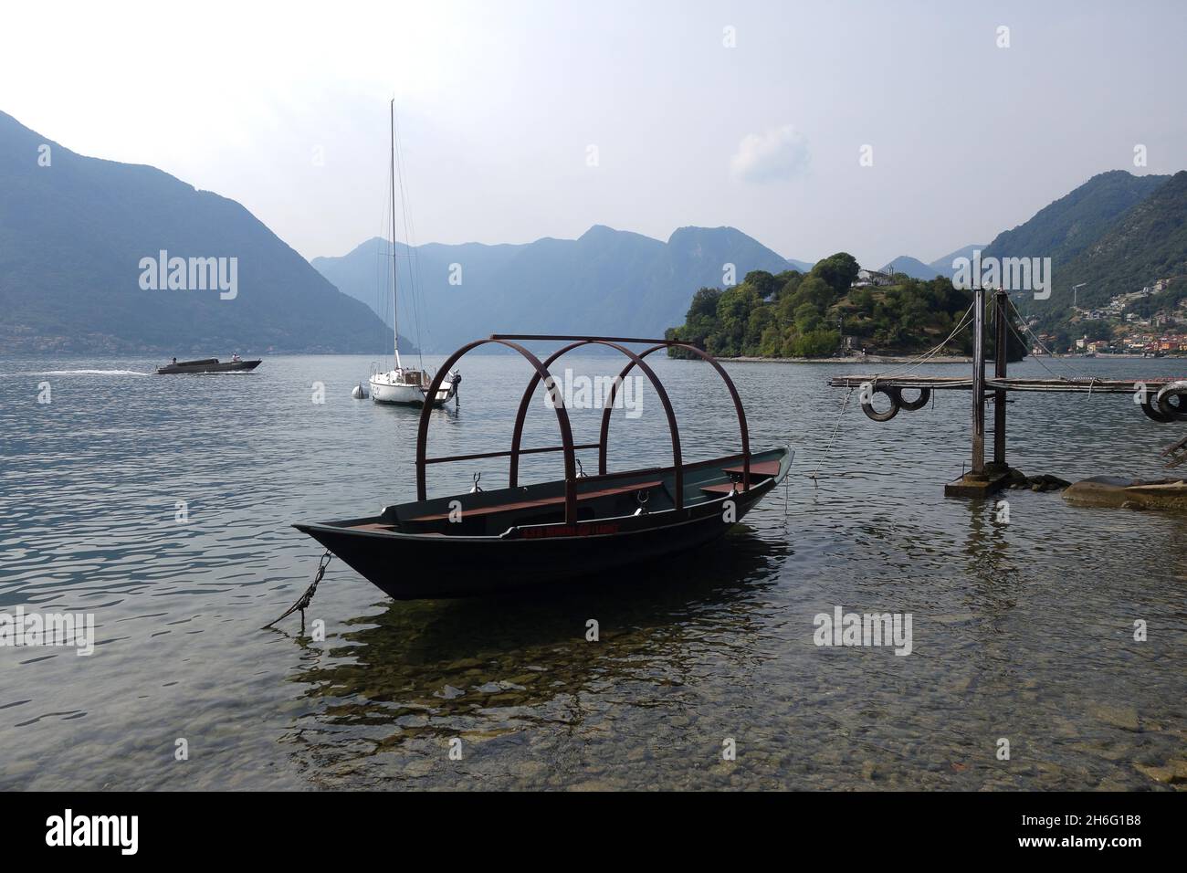 Traditional style fishing boat on Lake Como Italy Stock Photo - Alamy