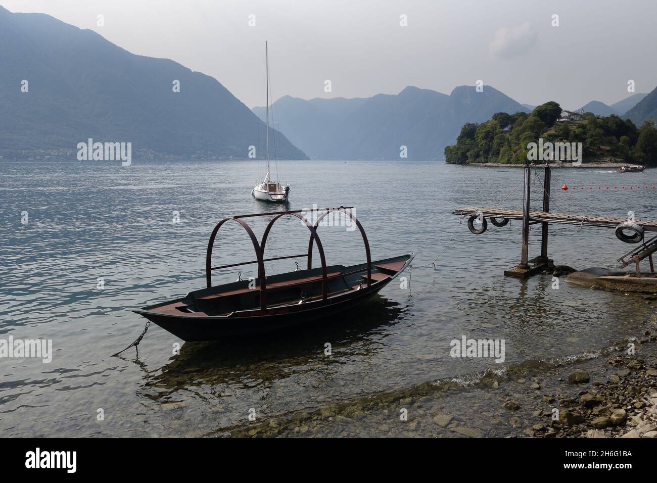 Traditional style fishing boat on Lake Como Italy Stock Photo - Alamy