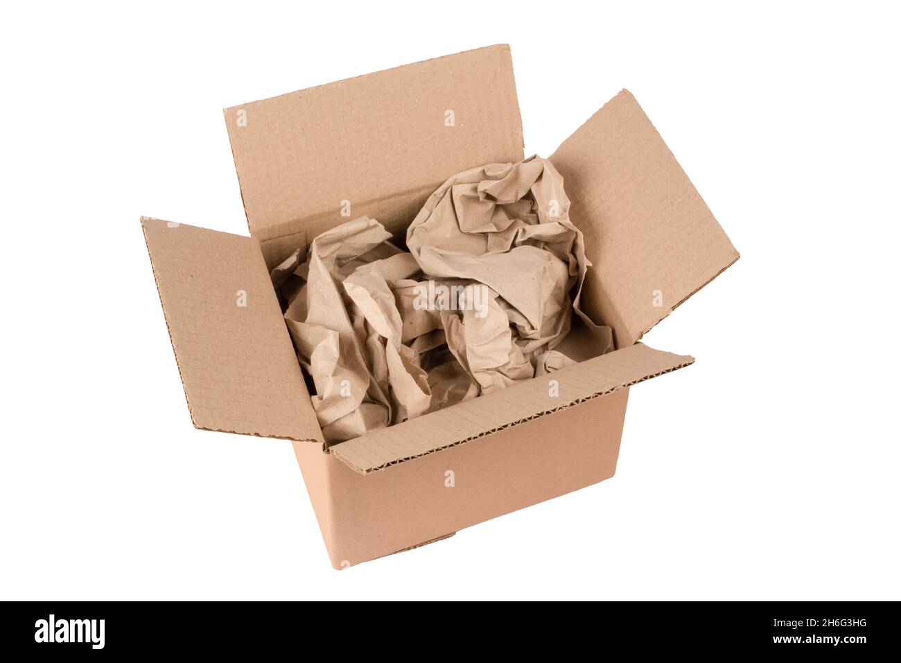 Square cardboard box with recycled filling paper isolated on white ...