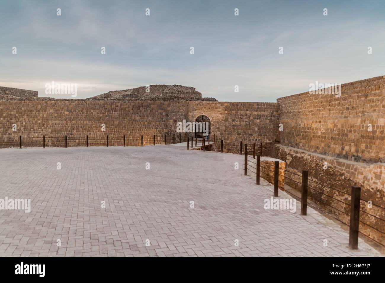 Gate of Bahrain Fort Qal'at al-Bahrain in Bahrain Stock Photo - Alamy