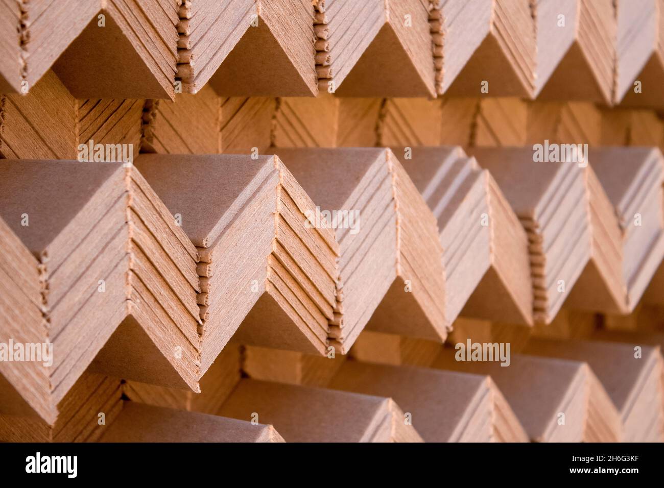 Stackes of cardboard angular edge protectors for protection goods while ...