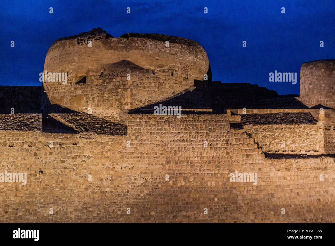 Tower of Bahrain Fort Qalat al-Bahrain in Bahrain Stock Photo - Alamy