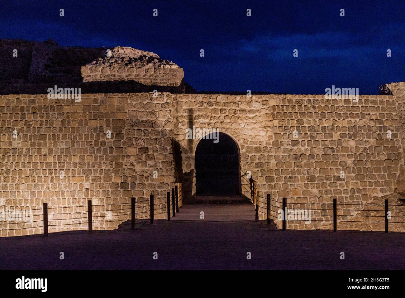 Gate of Bahrain Fort Qalat al-Bahrain in Bahrain Stock Photo - Alamy