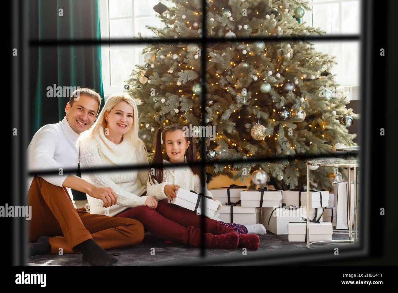 Young big family celebrating Christmas enjoying dinner, view from ...